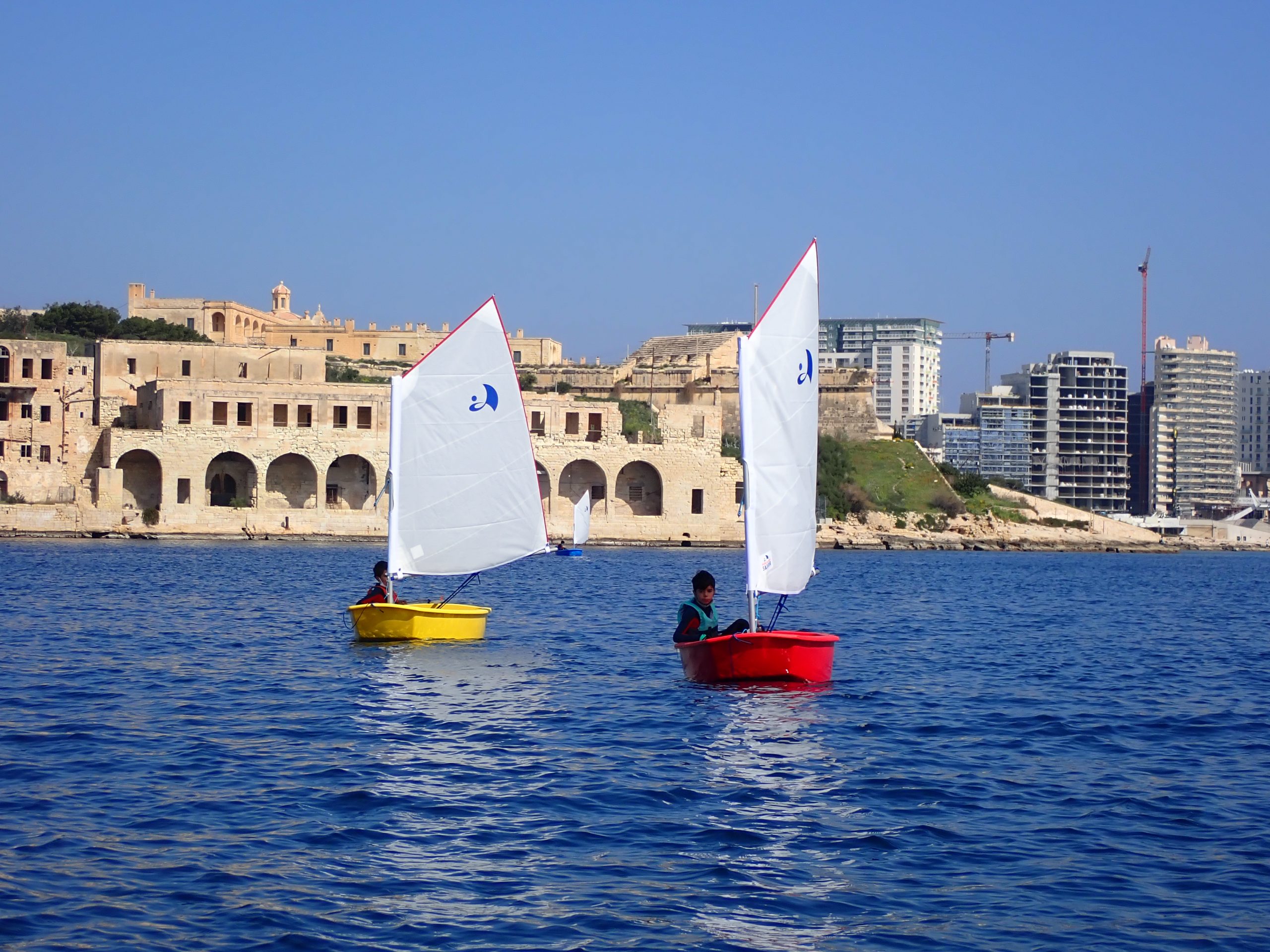 Yachting Malta » Optimist Training Boats in Action