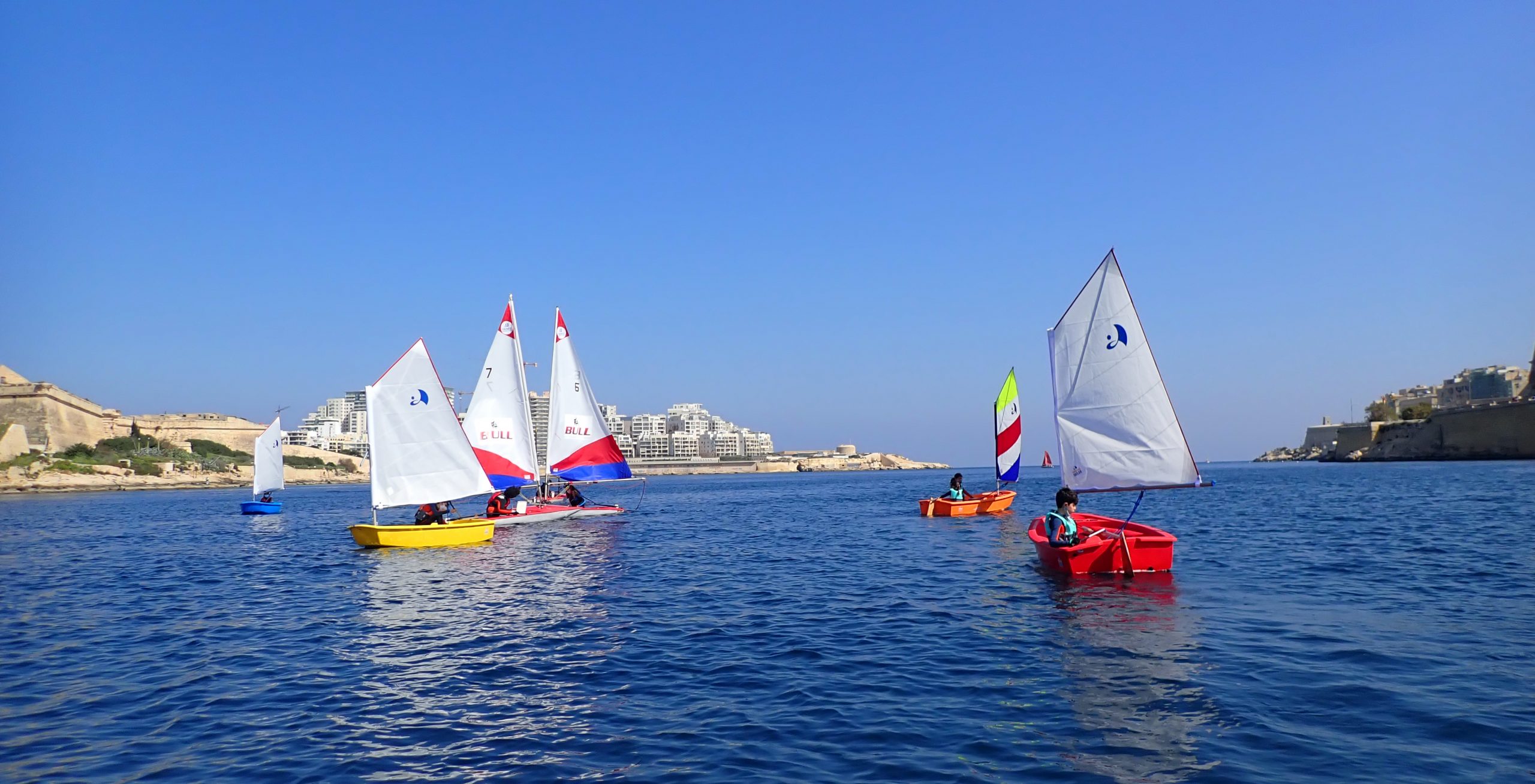 Yachting Malta » Optimist Training Boats in Action